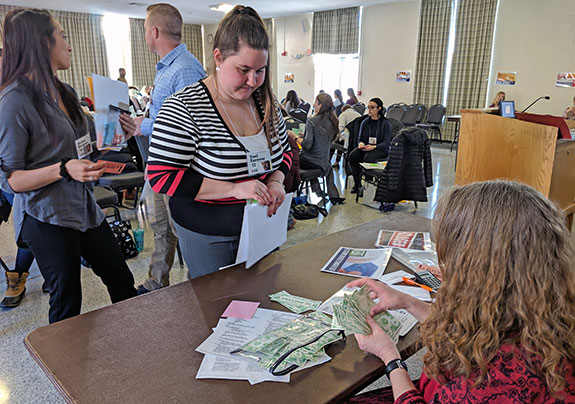 Rivier Hosts Community Action Poverty Simulation | Rivier University